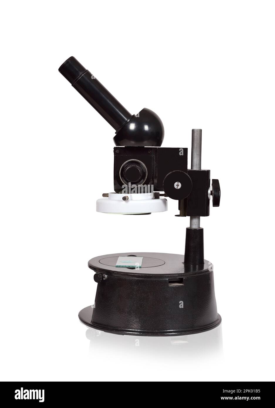 Side view of old microscope on white background Stock Photo - Alamy