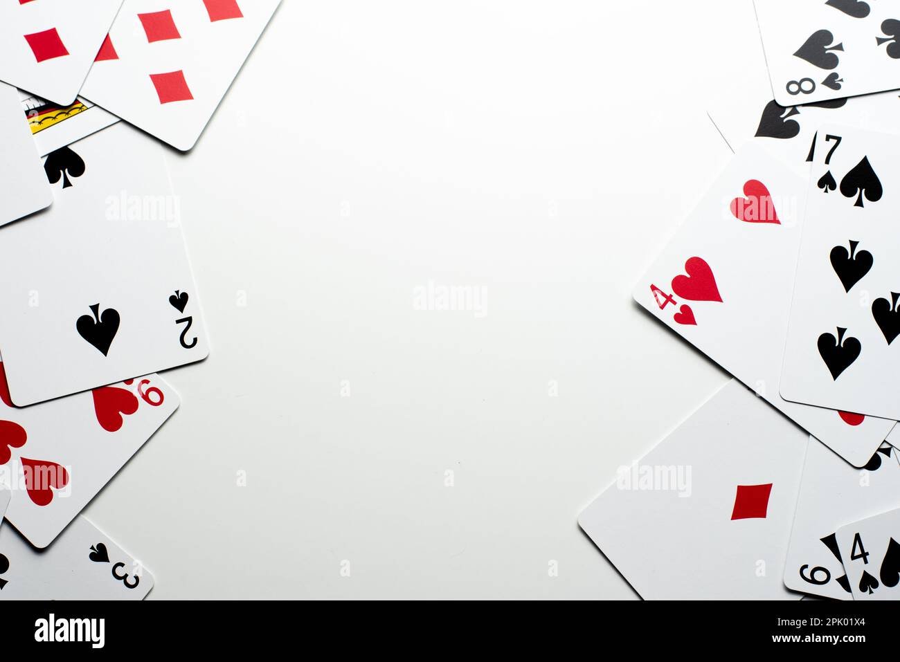 Isolated Scattered cards bordering a white background on left and right ...