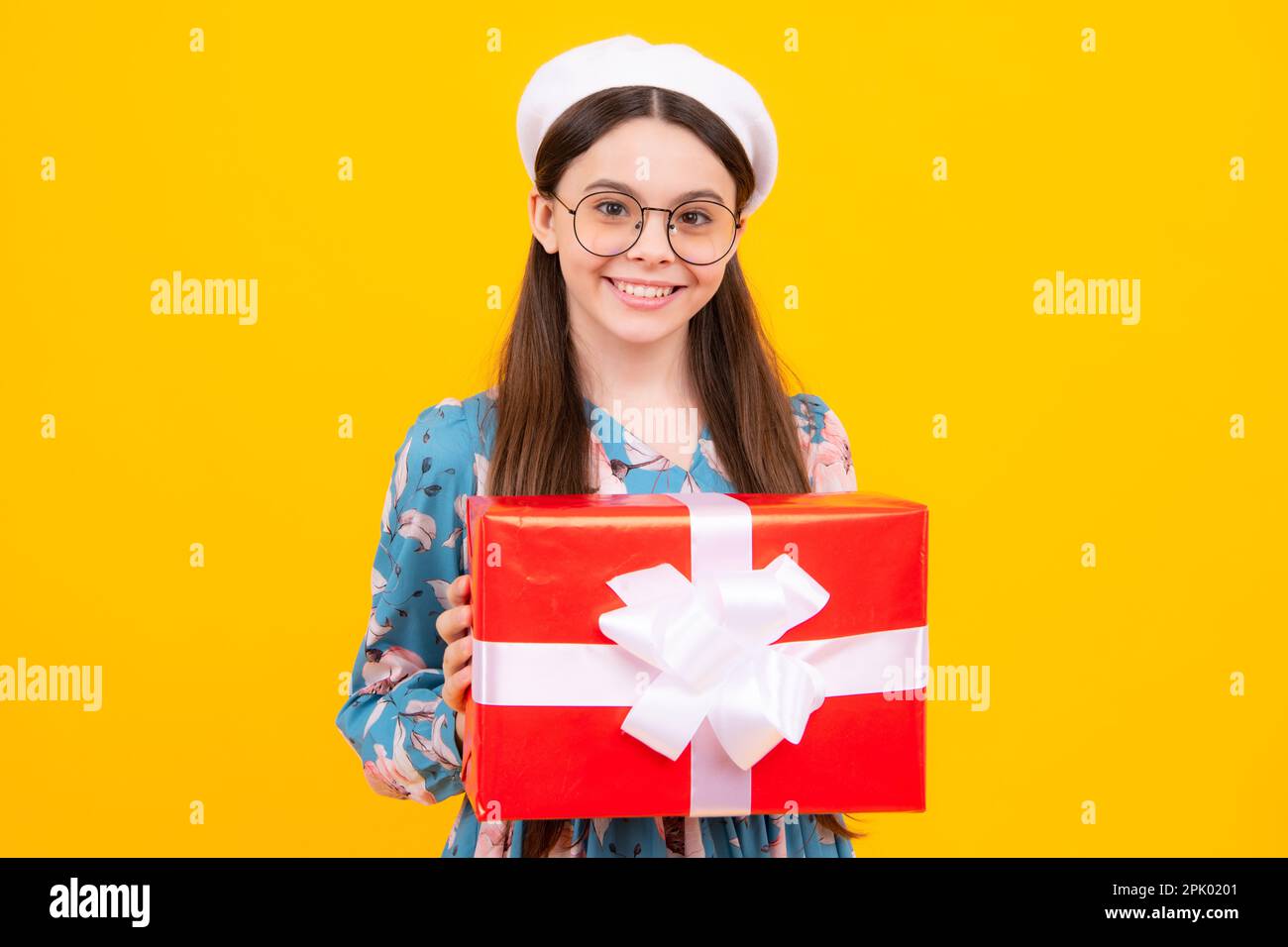 Teenager kid with present box. Teen girl giving birthday gift. Present ...