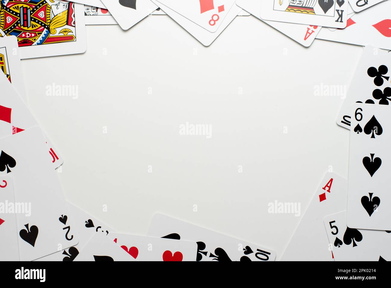 Isolated Scattered cards bordering a white background Stock Photo - Alamy