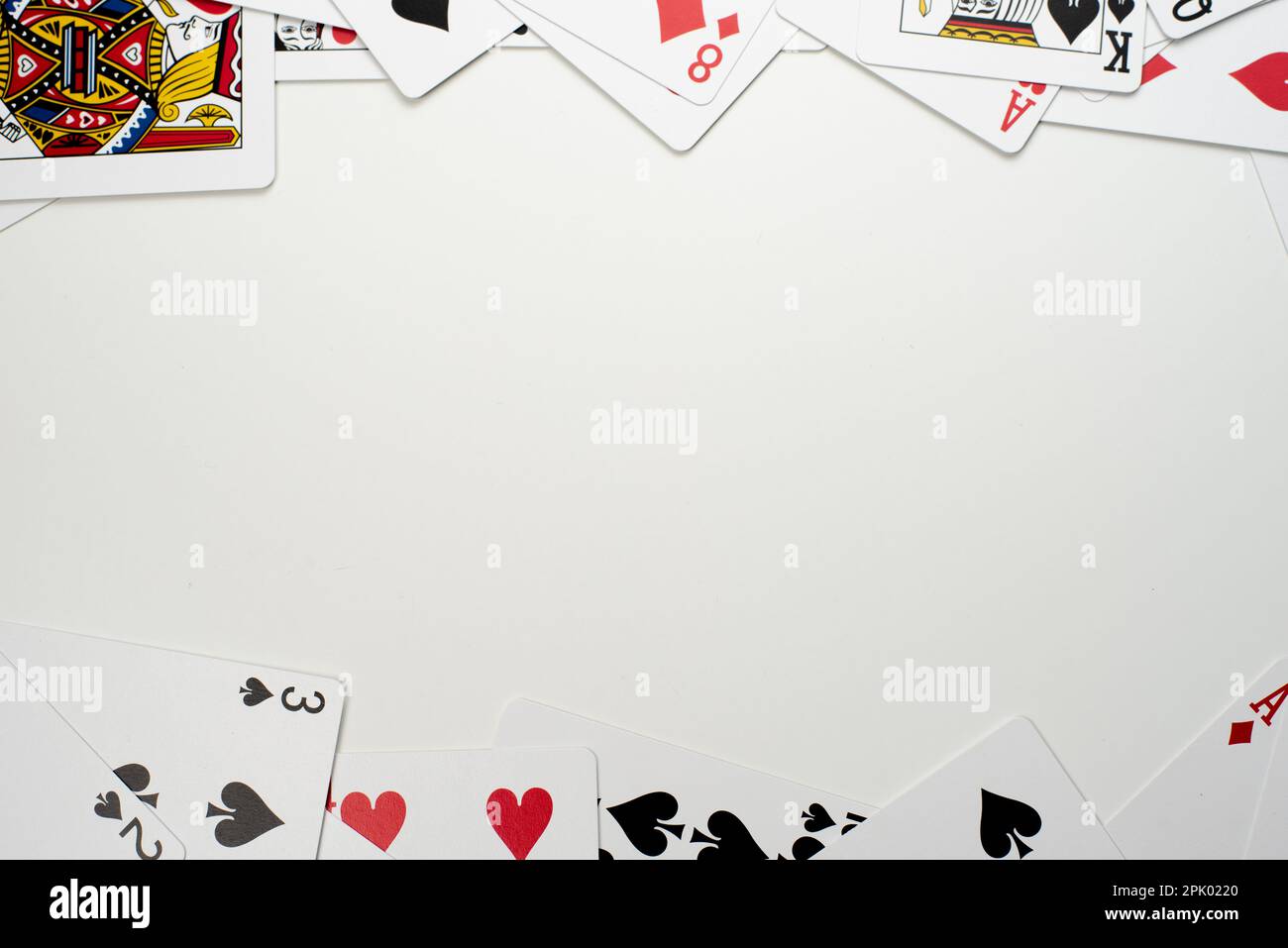 Isolated Scattered cards bordering a white background on top and bottom ...