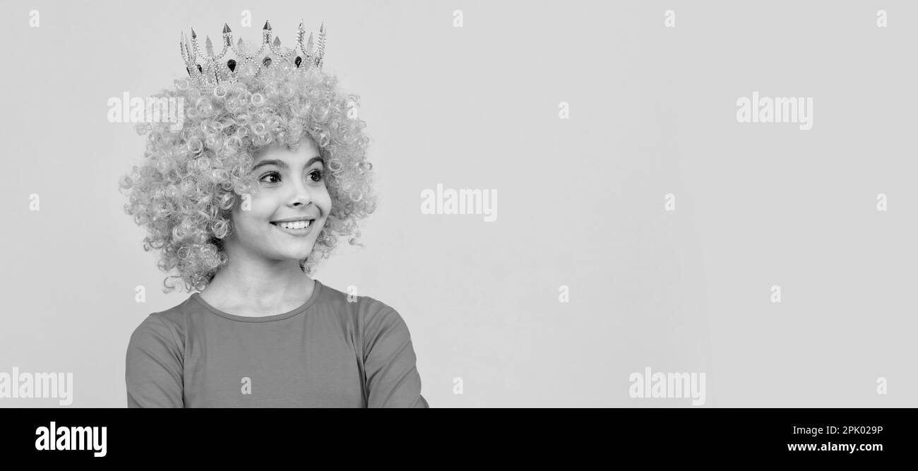 nice smile. imagine herself a princess. funny child in diadem. selfish ...
