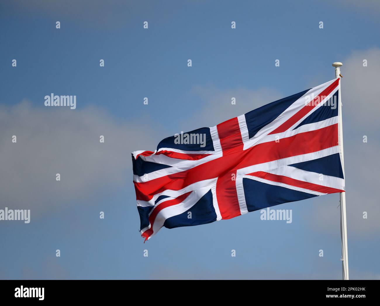 A Union Flag, also known as a Union Jack, fluttering in the wind ...