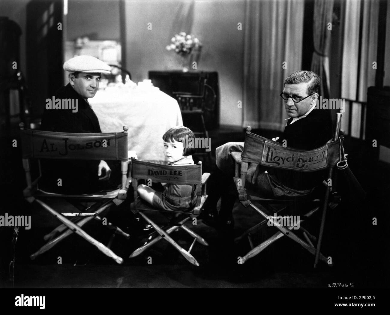 AL JOLSON DAVEY LEE and Director LLOYD BACON on set candid during filming of SAY IT WITH SONGS ...