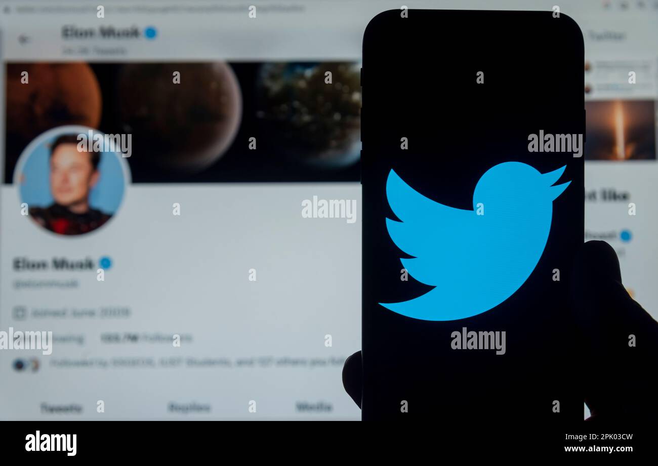 In this photo illustration, the twitter logo seen displayed on a mobile ...