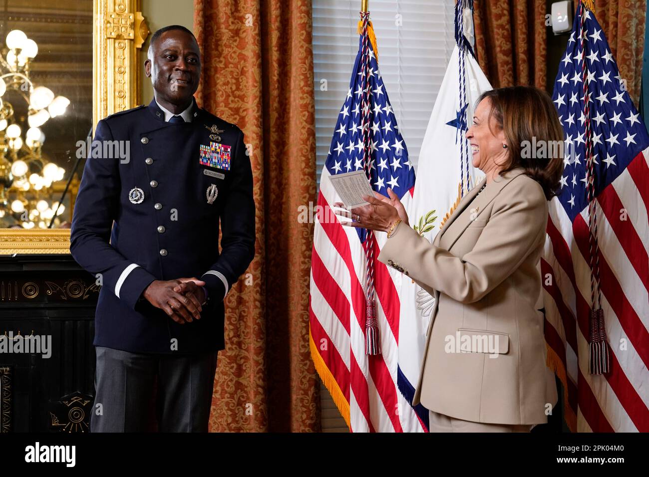 Vice President Kamala Harris applauds during a ceremonial promotion of ...