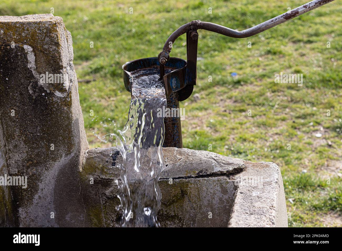 Old pump used to extract water from the field in Turkey. Retro well ...