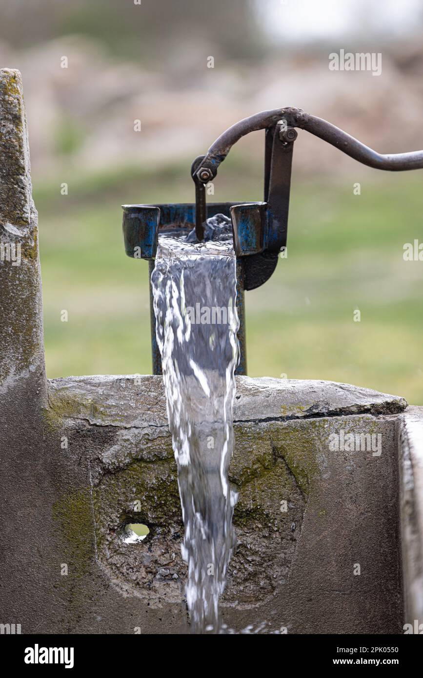 Old pump used to extract water from the field in Turkey. Retro well ...