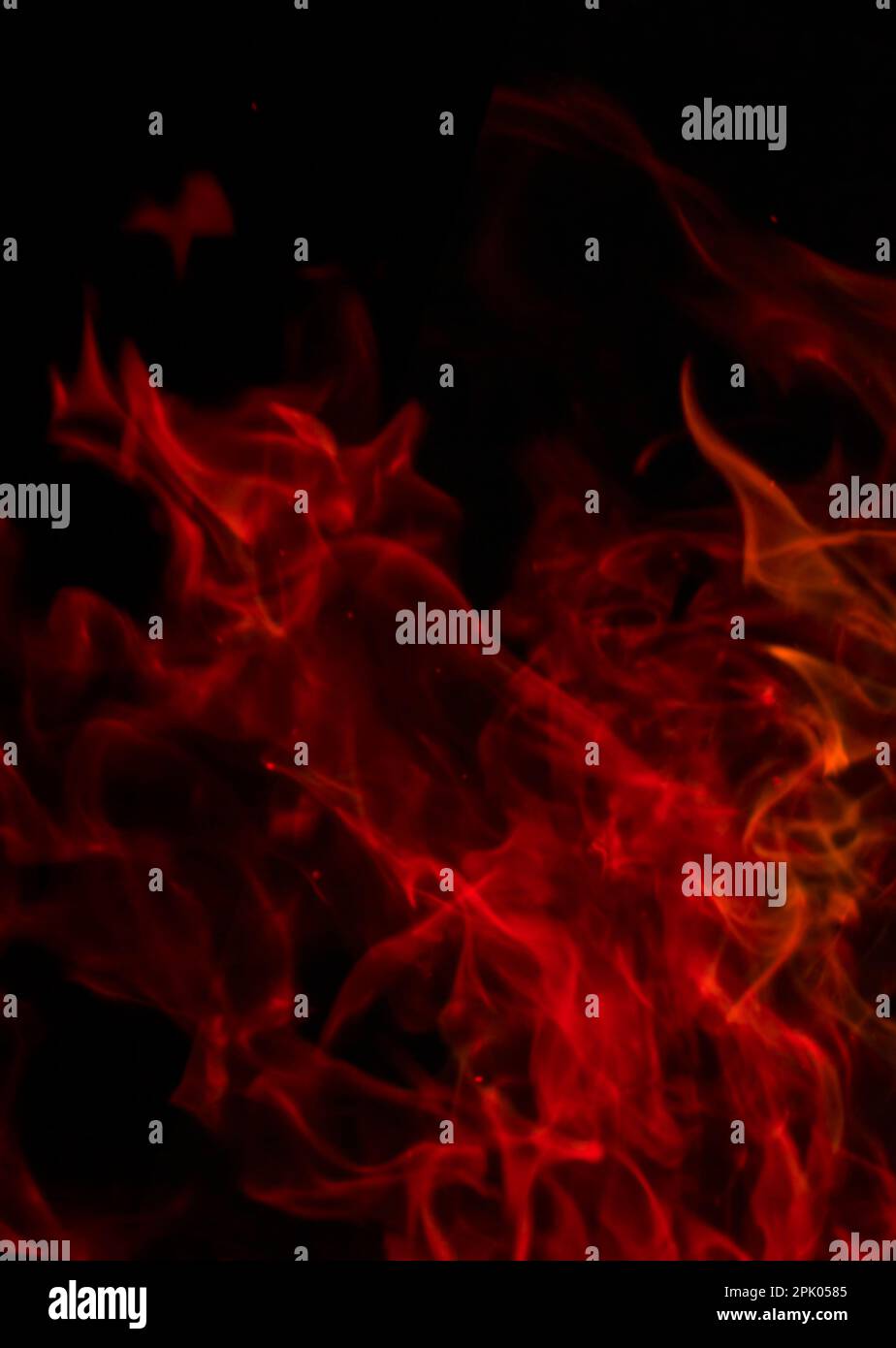 Blurred red flame in motion on a black background. Abstraction in red ...