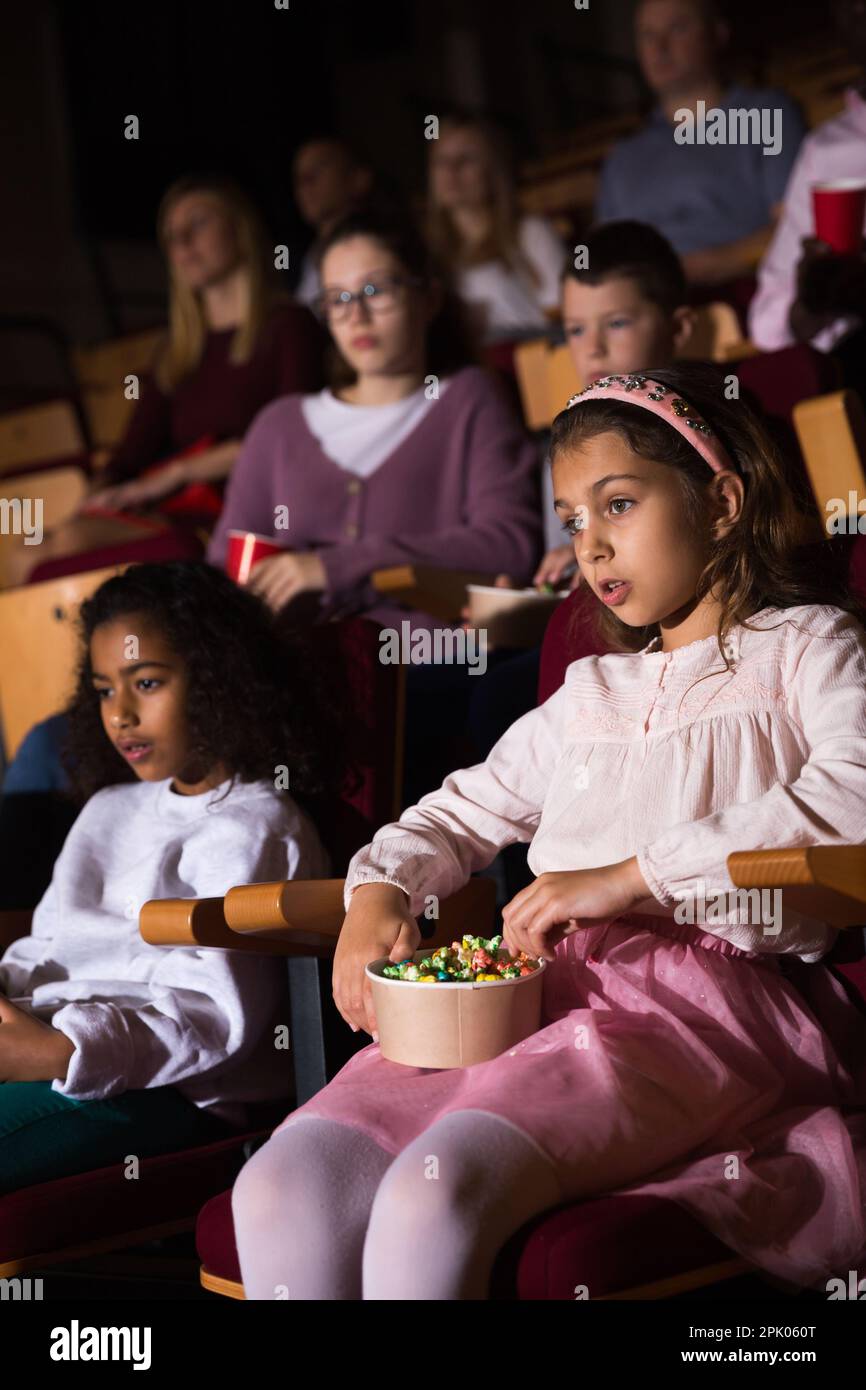 kids sitting at movie in auditorium in cinema Stock Photo - Alamy
