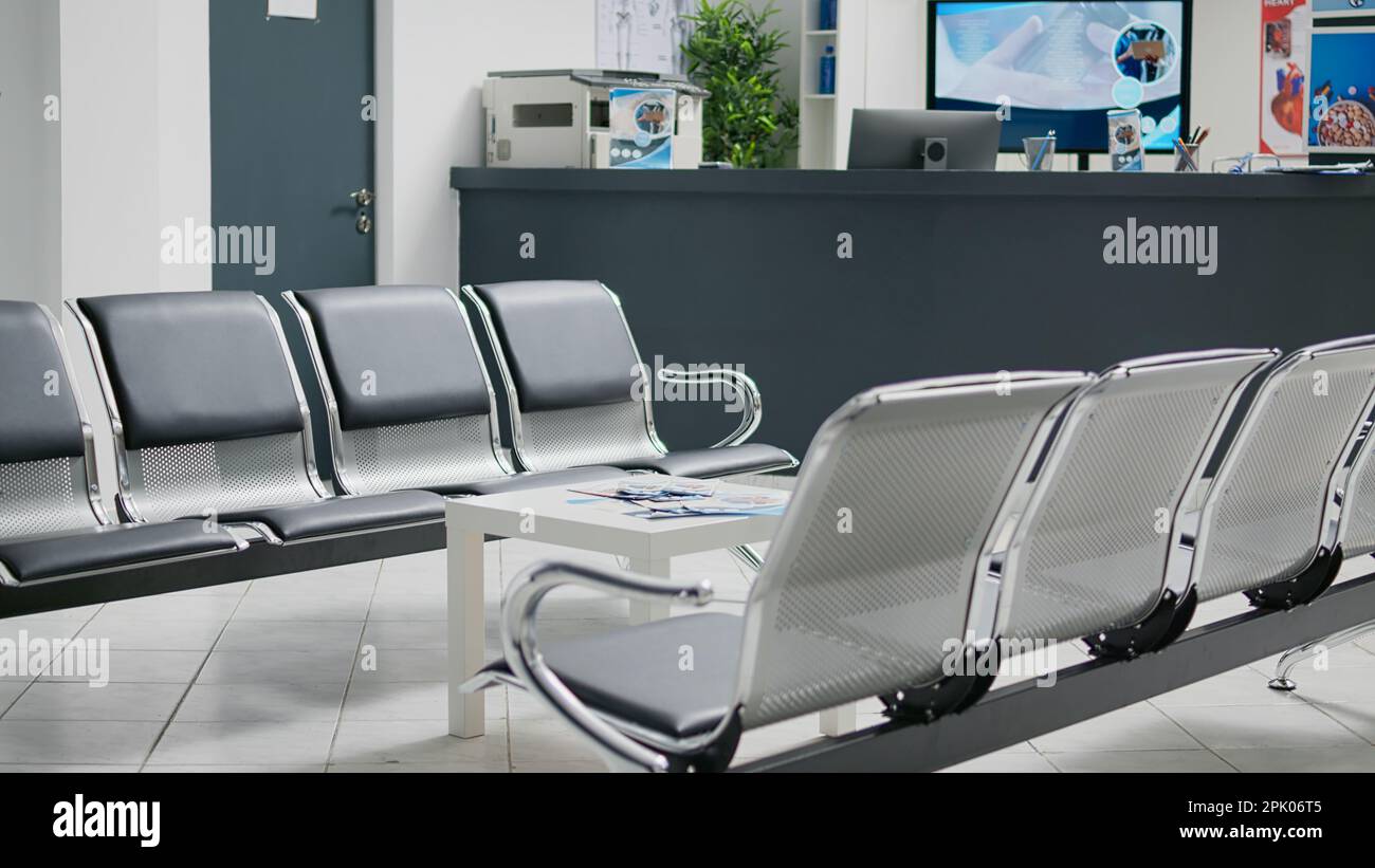 Professional waiting room with chairs in clinic hallway, reception ...