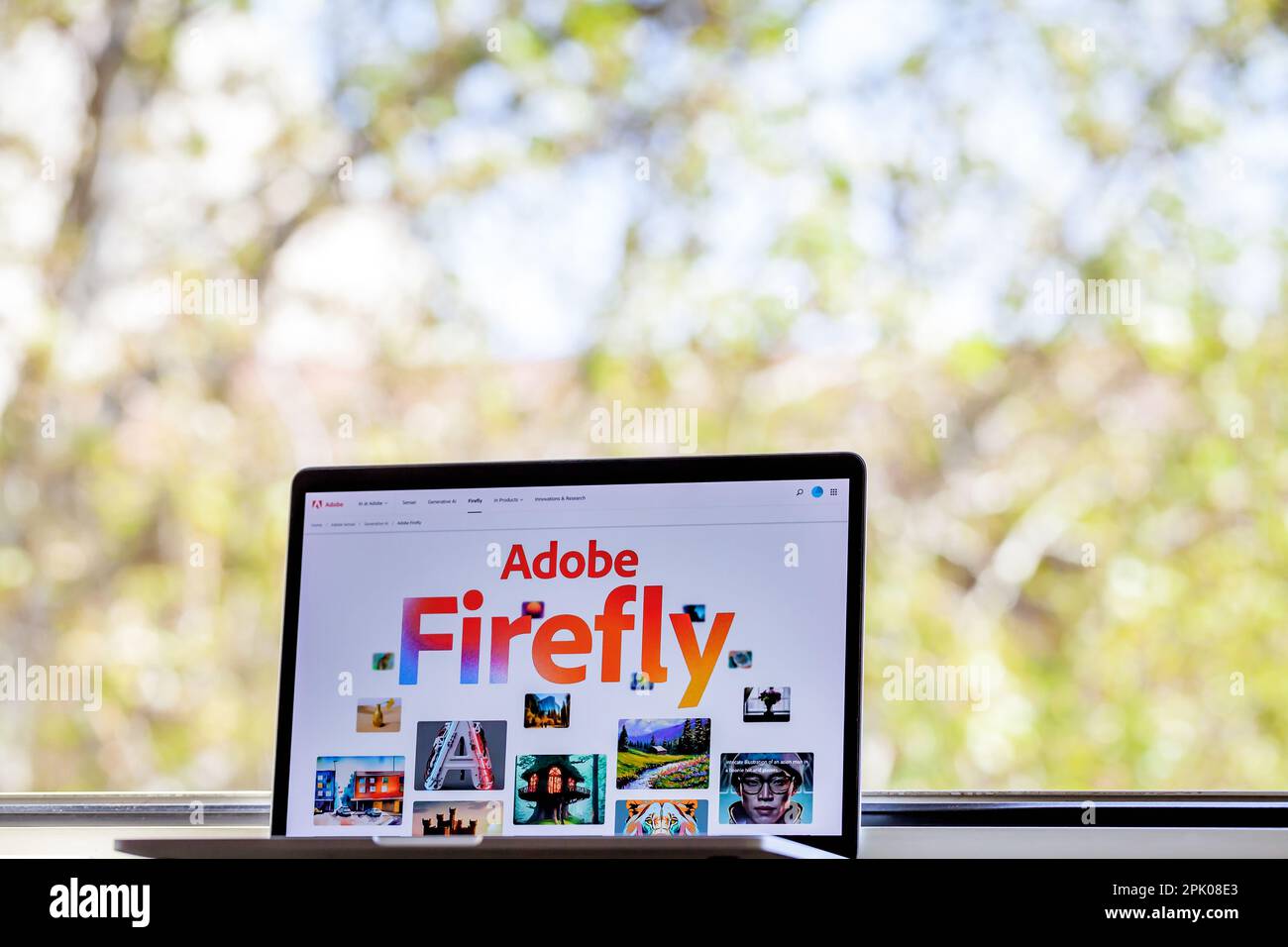 ITALY - April 4, 2023: Adobe Firefly website displayed on mac laptop screen. Adobe has announced ...