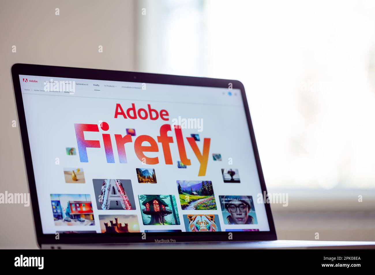 ITALY - April 4, 2023: Adobe Firefly website displayed on mac laptop screen. Adobe has announced ...