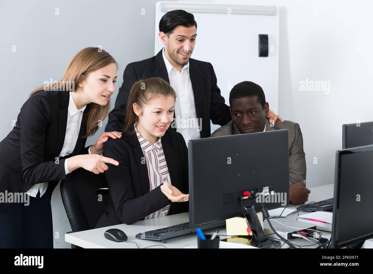 employees developing strategy for teamwork Stock Photo - Alamy