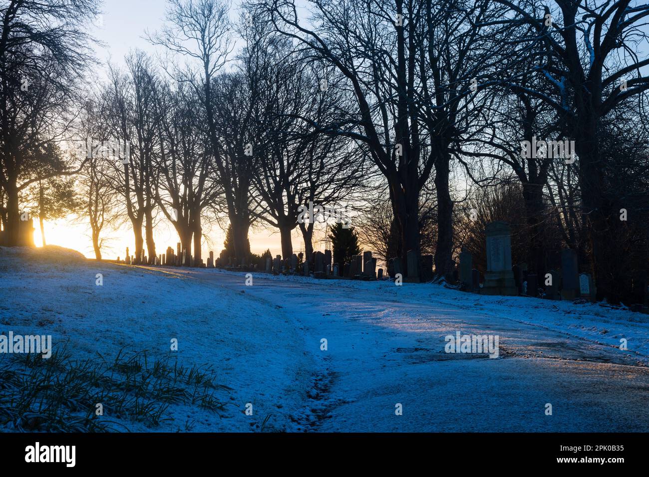 Cemetery sunrise winter Stock Photo - Alamy