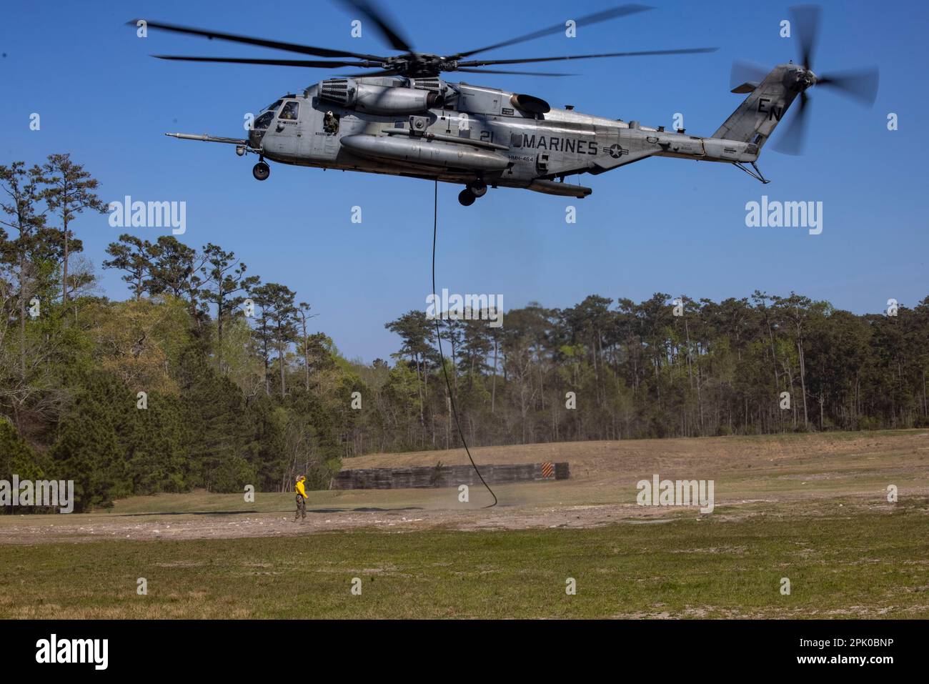 U.S Marine Corps Staff Sgt. Devin Rockett, a ropes and recovery ...