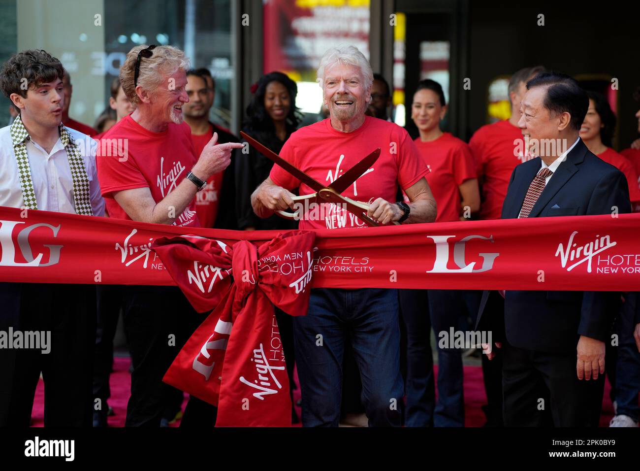 Colton Ryan, left, James Bermingham, Richard Branson and John Lam ...