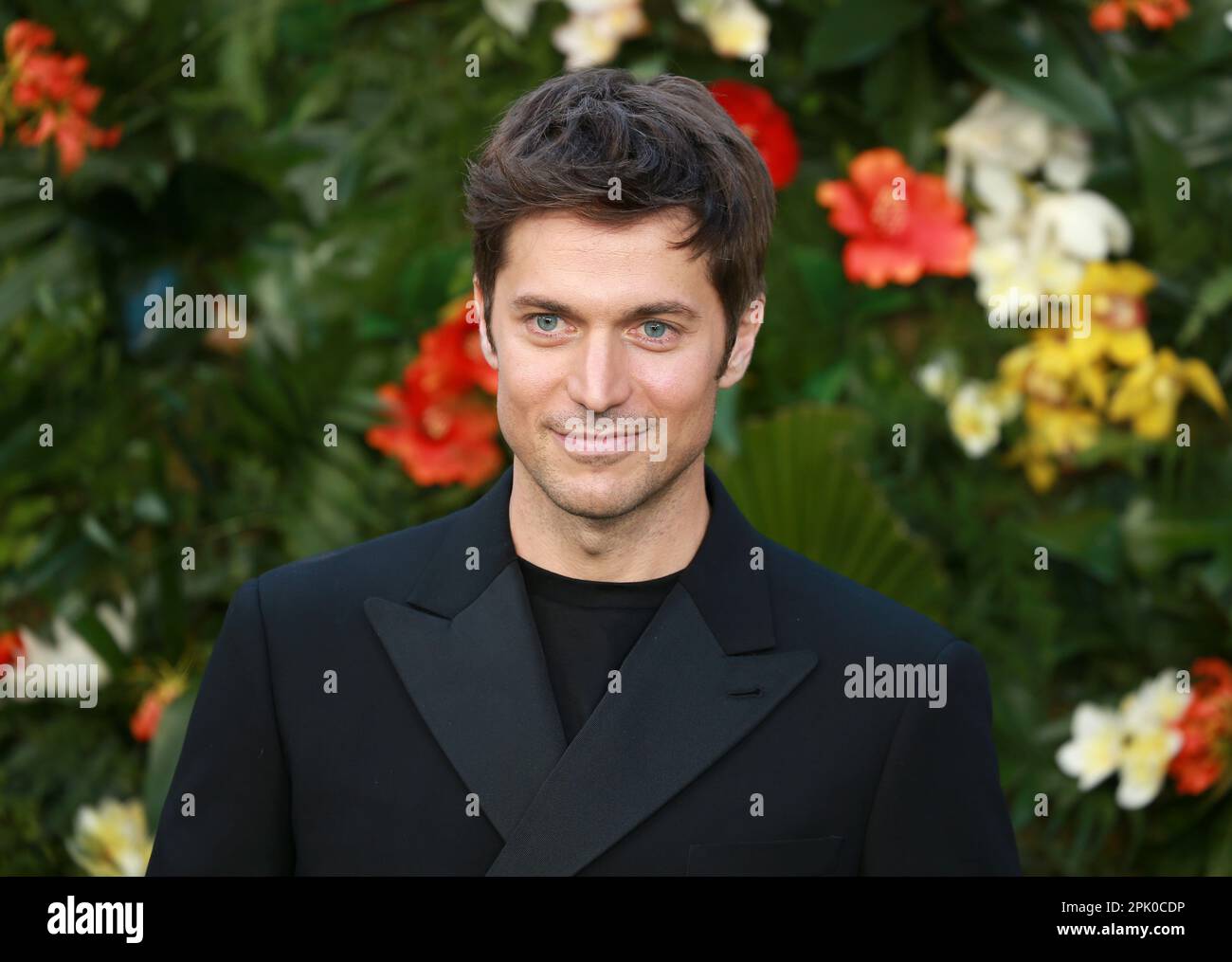 Lucas Bravo attends the "Ticket To Paradise" World Film Premiere at ...