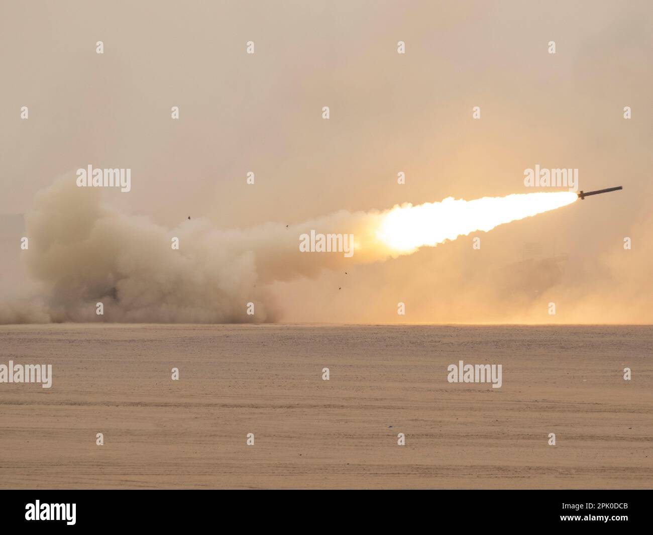 Smoke pours from the back of a rocket as it is fire from a High ...