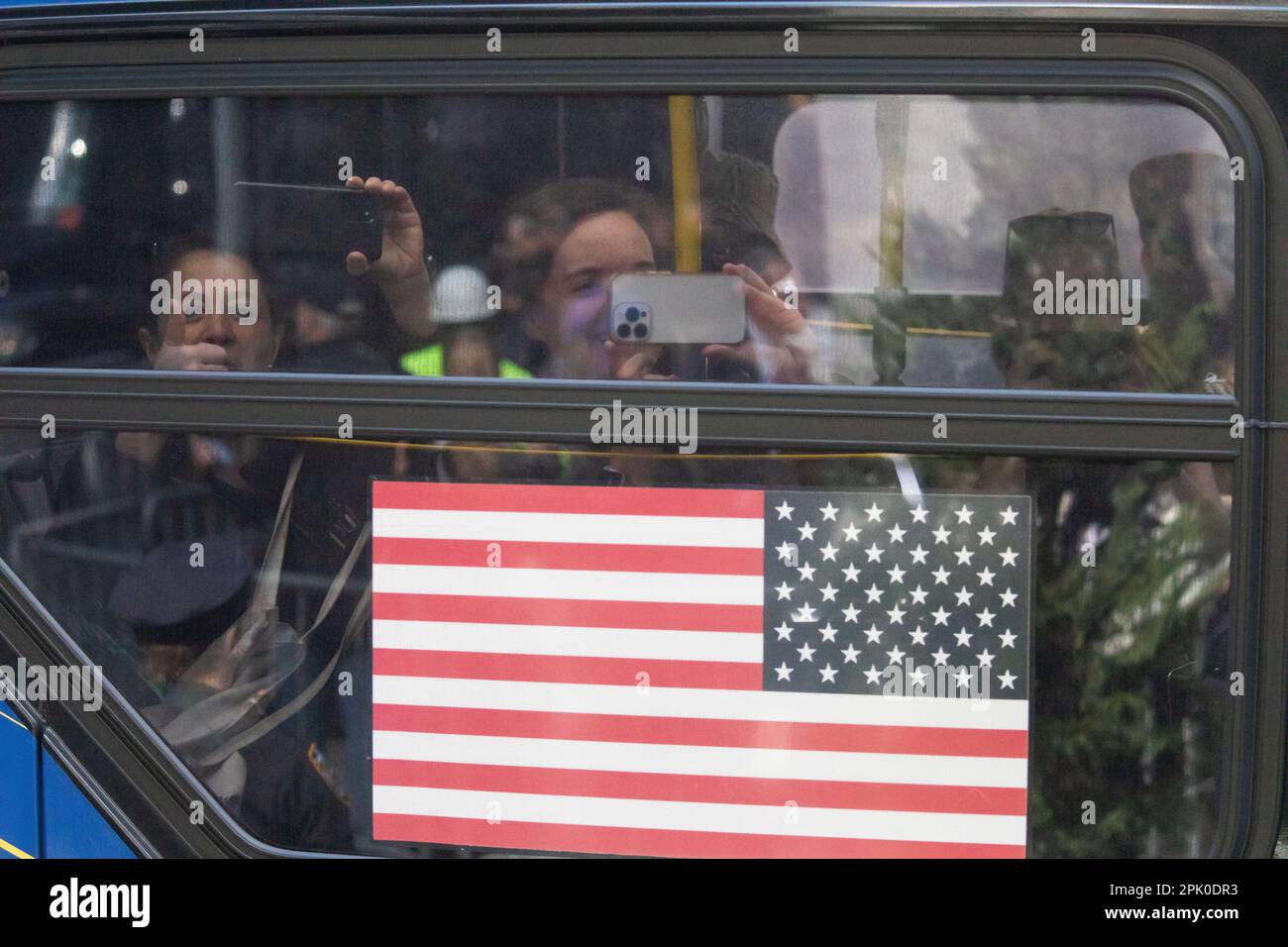 New York, USA. 4th Apr, 2023. Passengers take photos as they pass Trump ...