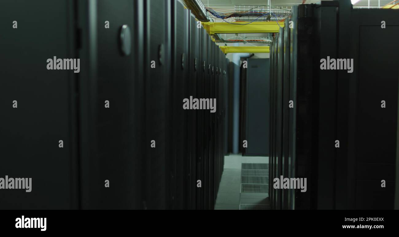 General view of black servers in row in empty server room Stock Photo ...