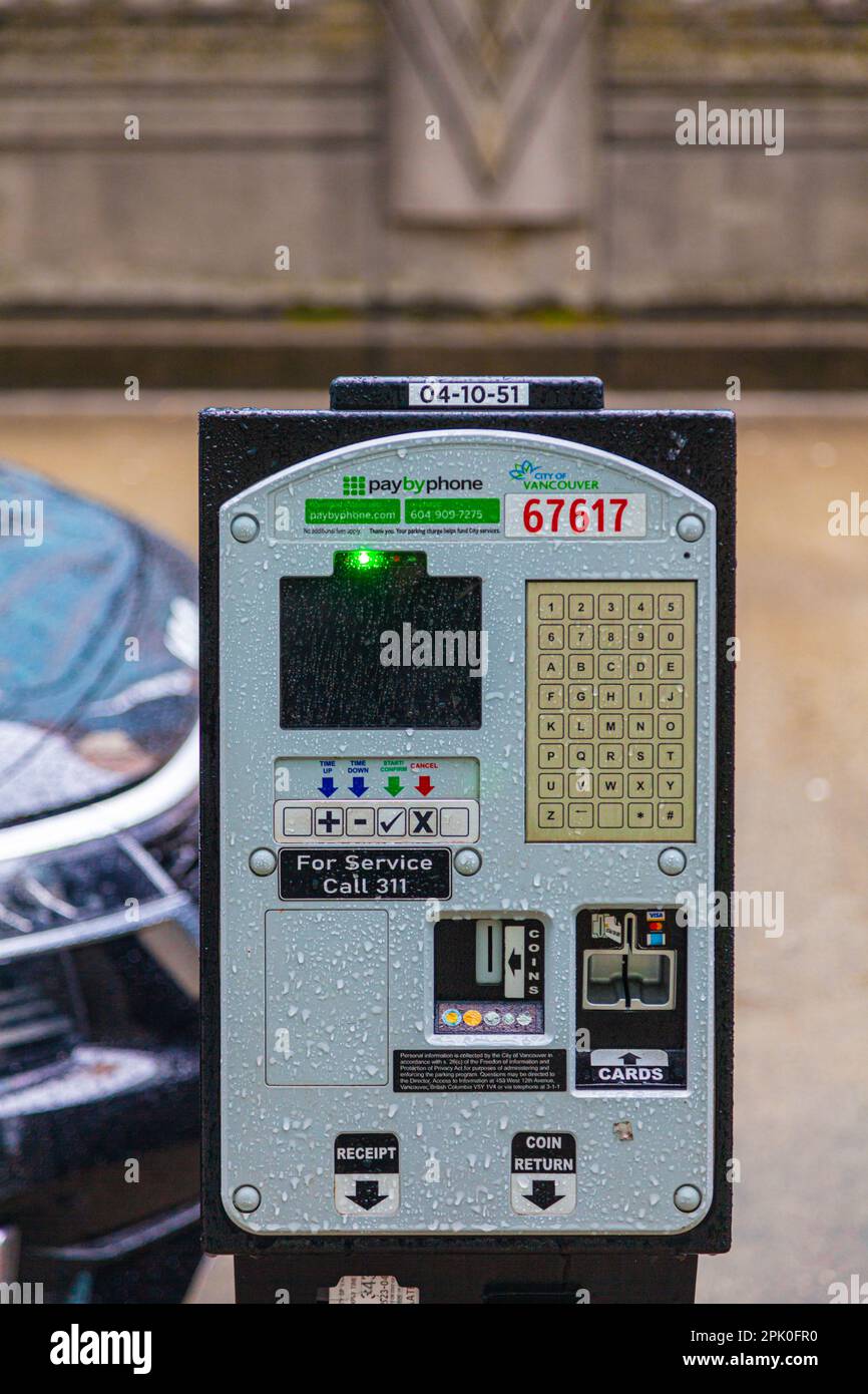 Modern parking meter on the streets of Vancouver Canada Stock Photo - Alamy
