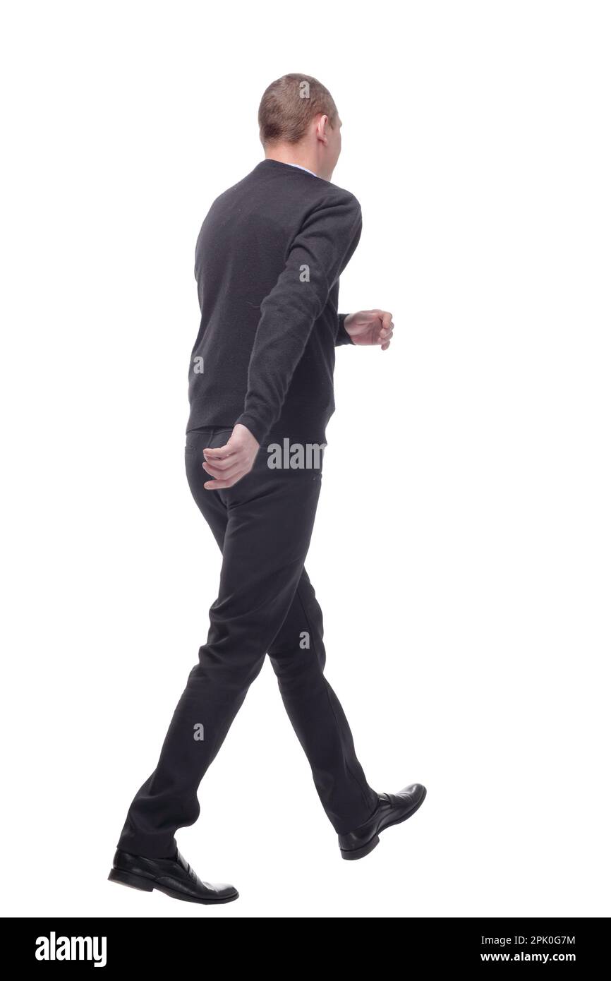 full length back view portrait of a young casual man walking away from ...