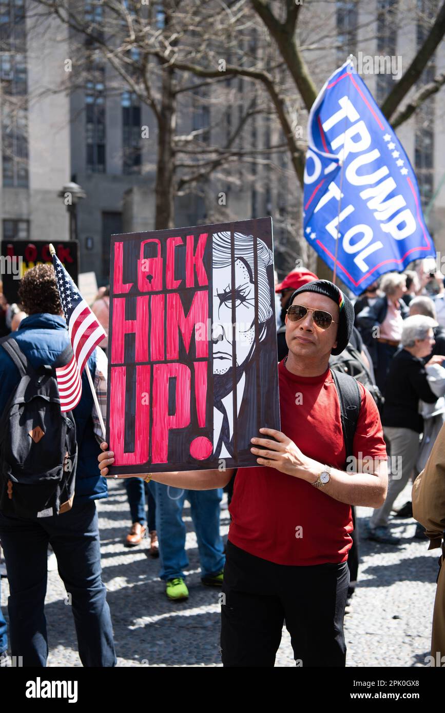 An anti Trump protestor outside the former president's arraignment in ...