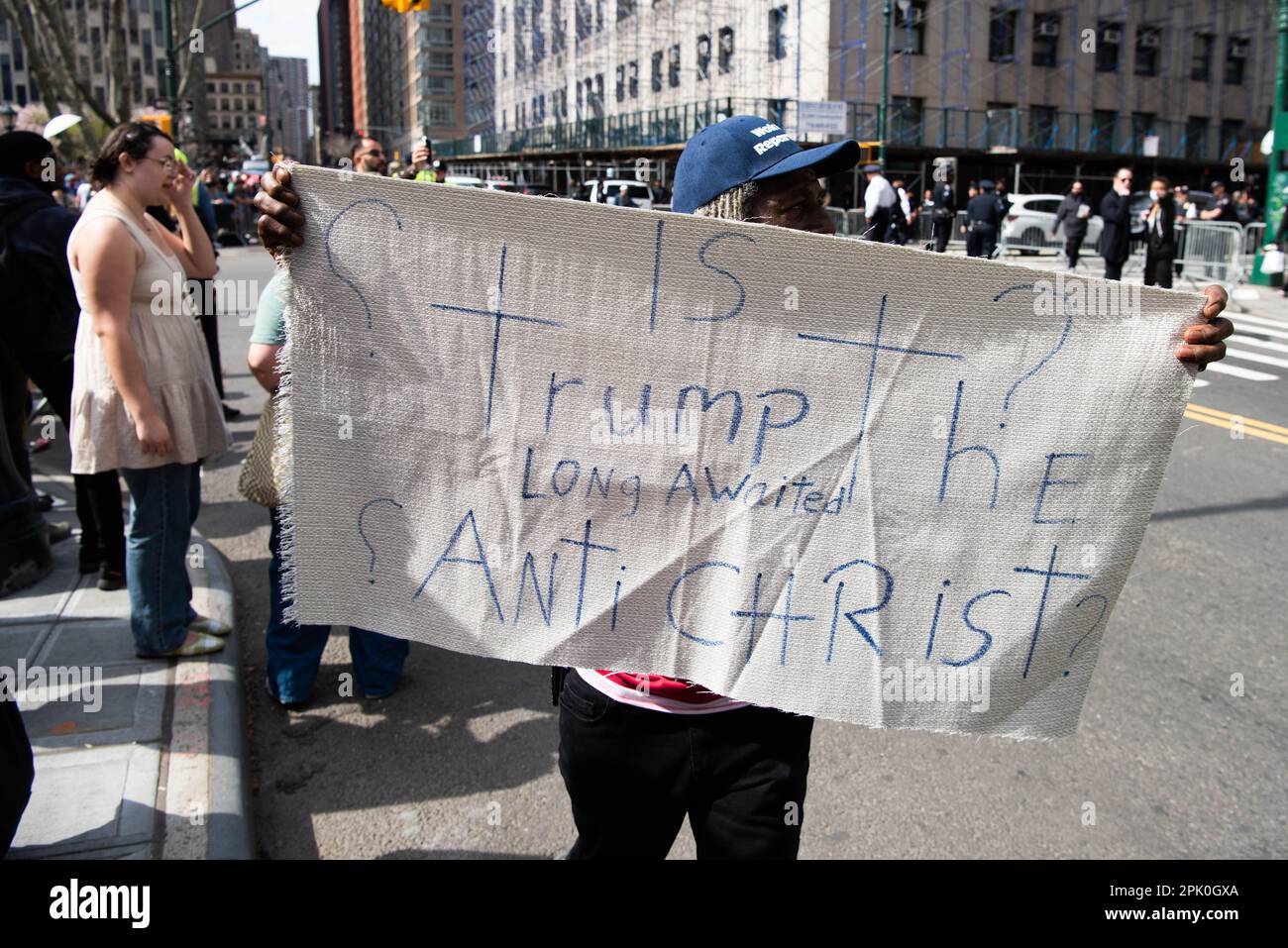 An anti Trump protestor outside the former president's Arraignment ...