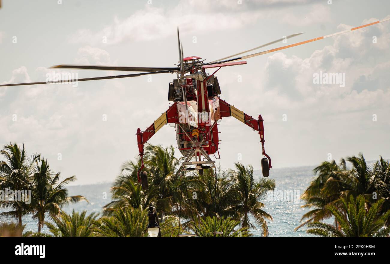 Hallandale Beach, Miami, Florida - April 4, 2023: Helicopter lifting ...