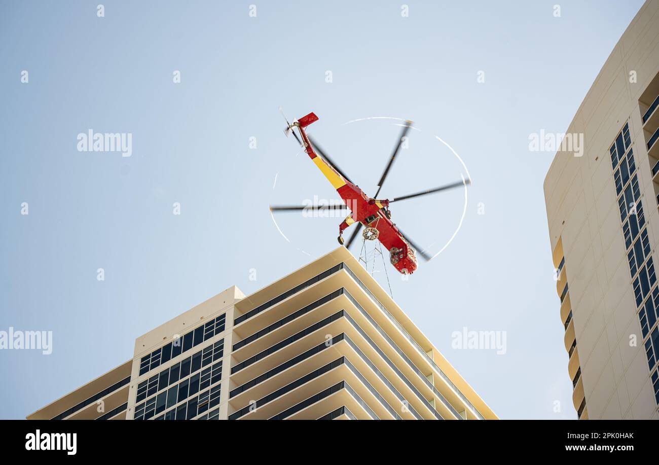 Hallandale Beach, Miami, Florida - April 4, 2023: Helicopter lifting ...