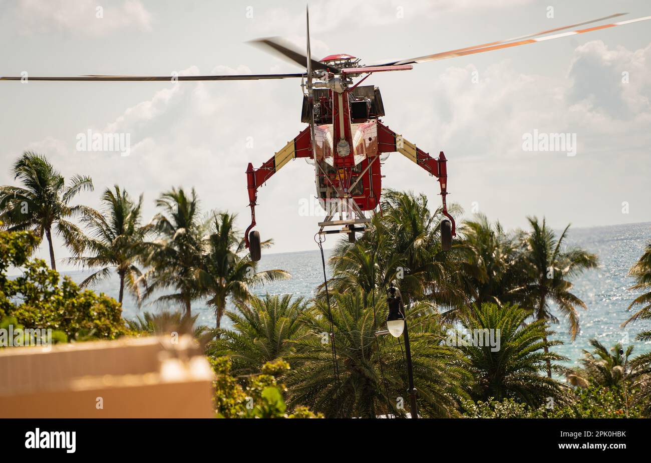 Hallandale Beach, Miami, Florida - April 4, 2023: Helicopter lifting ...