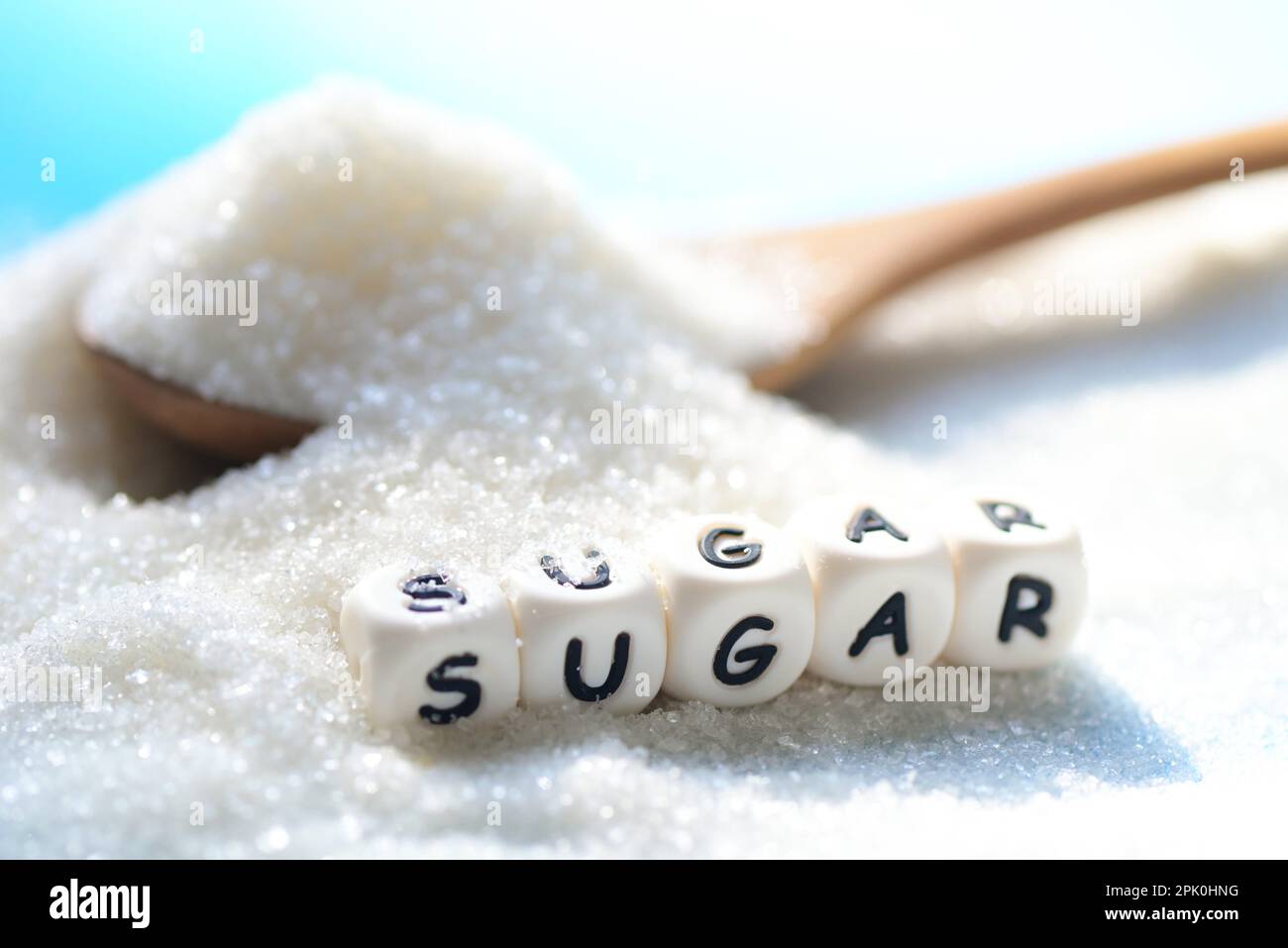 No sugar concept, Sugar on spoon and blur background, white sugar for ...