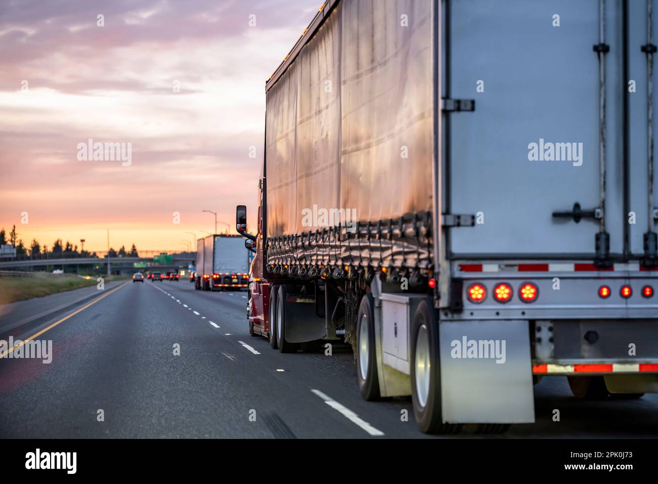 High cab long hauler freight burgundy big rig industrial semi truck ...