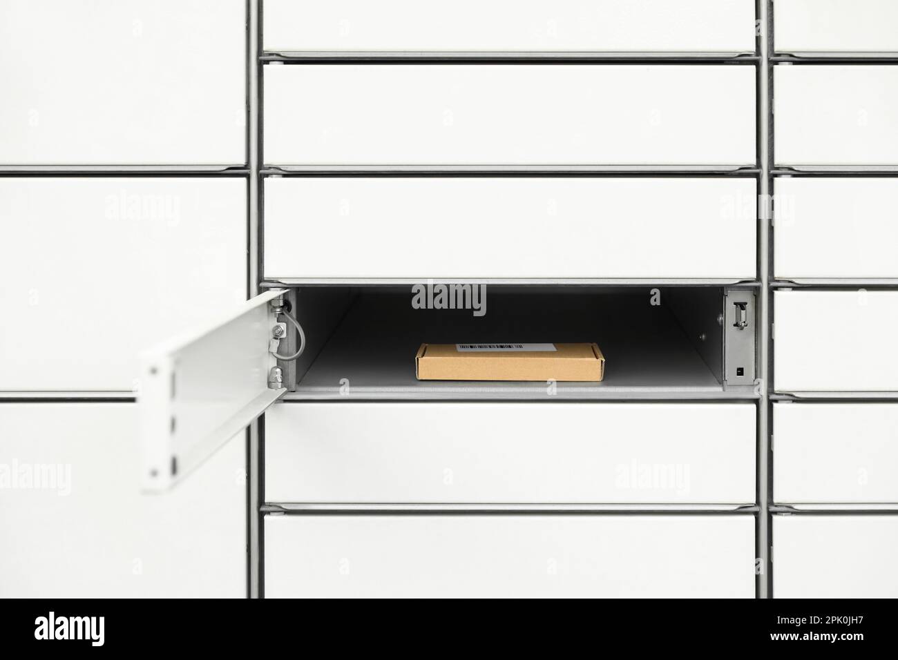 Parcel in locker of automated postal box Stock Photo - Alamy