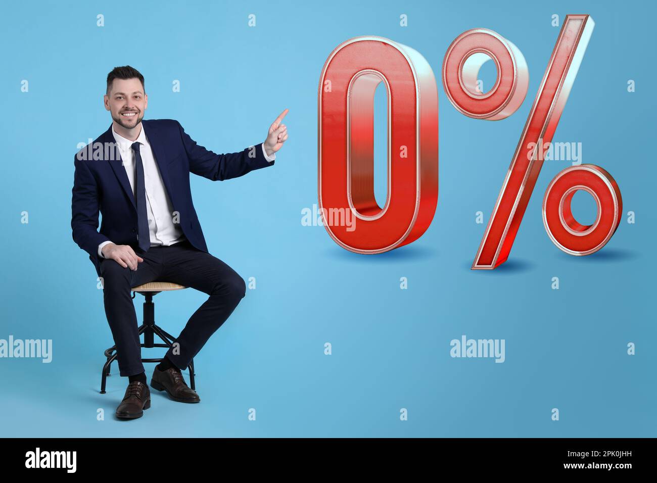 Handsome man pointing at sign Zero Percent on light blue background ...
