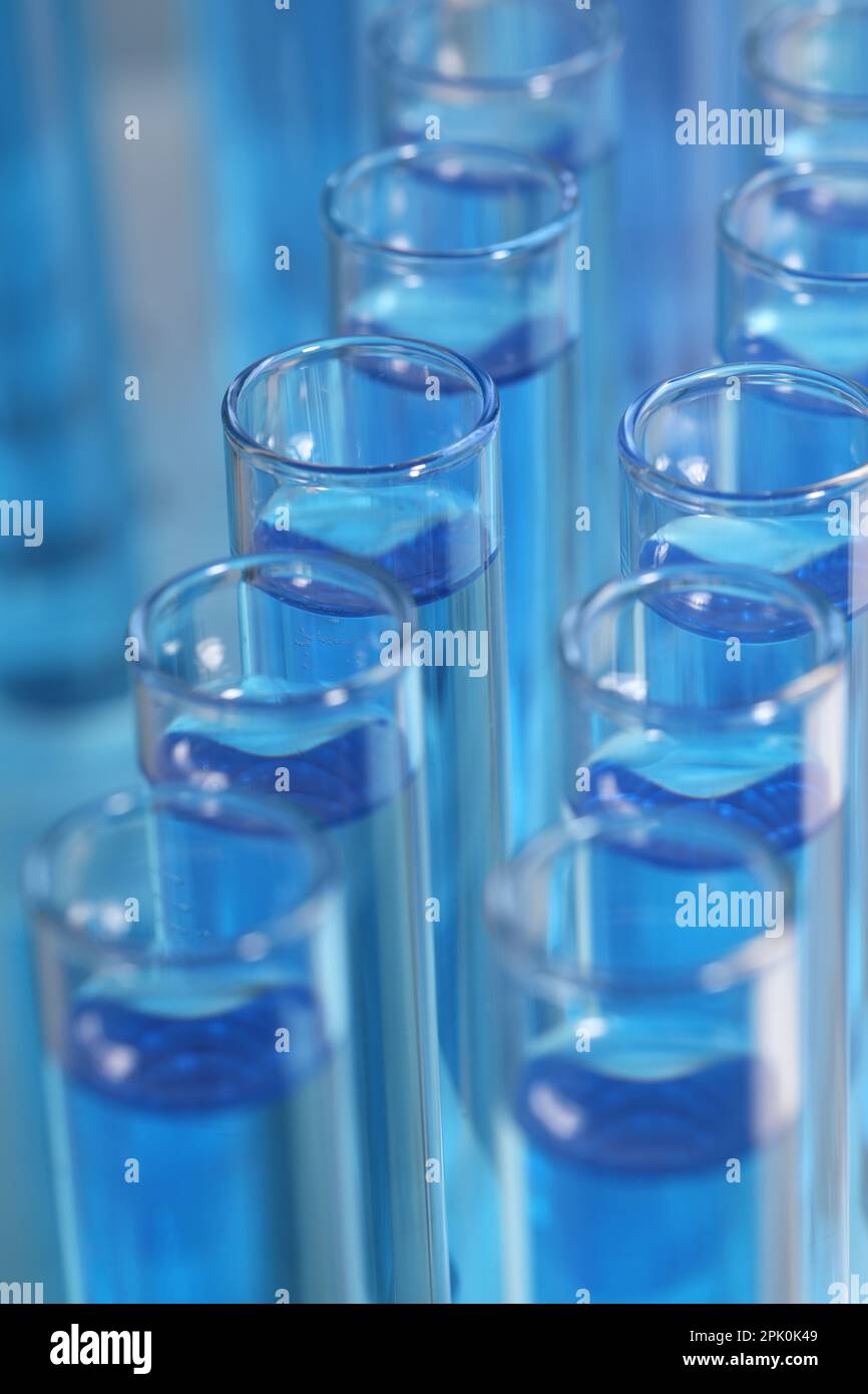 Test tubes with light blue reagents, closeup. Laboratory analysis Stock ...
