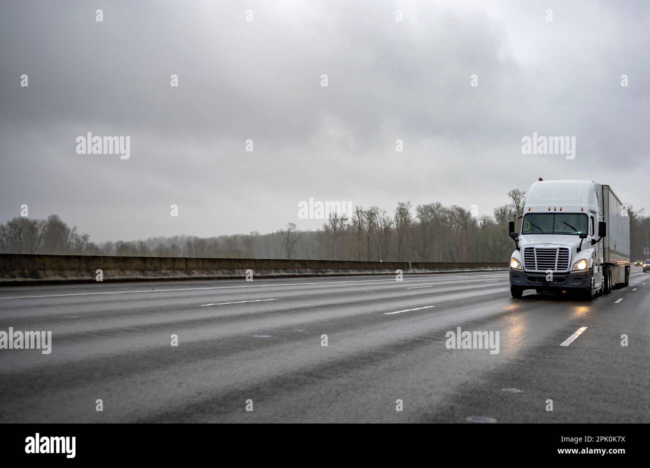 High cab profile white long hauler big rig industrial semi truck ...