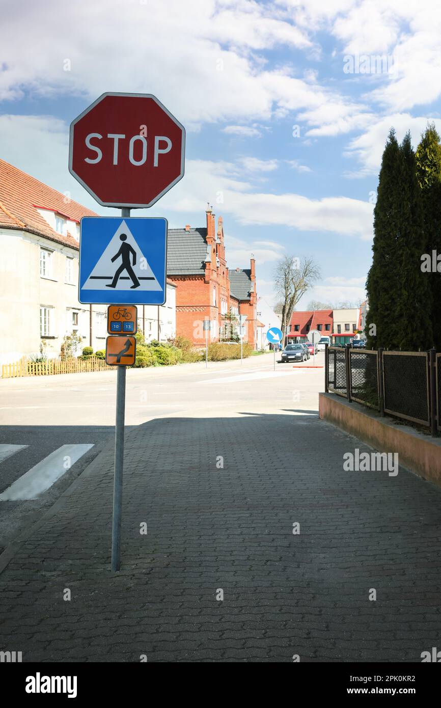 Many different traffic signs on city street Stock Photo - Alamy