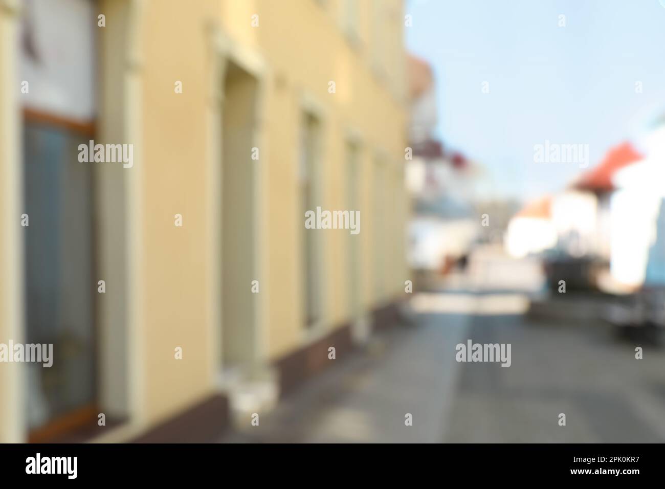Blurred view of city street with beautiful building. Bokeh effect Stock ...