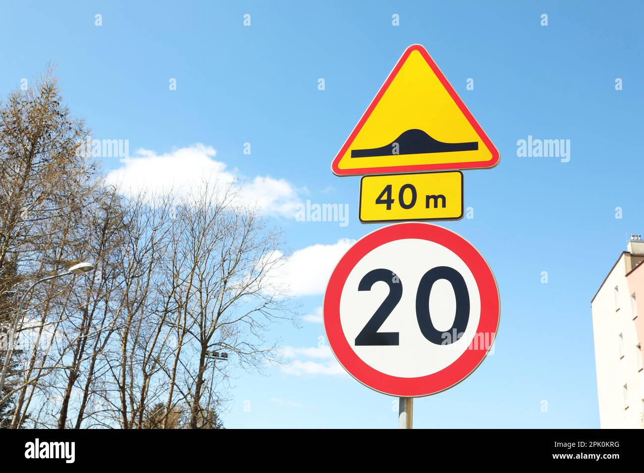 Different traffic signs on city street, space for text Stock Photo - Alamy