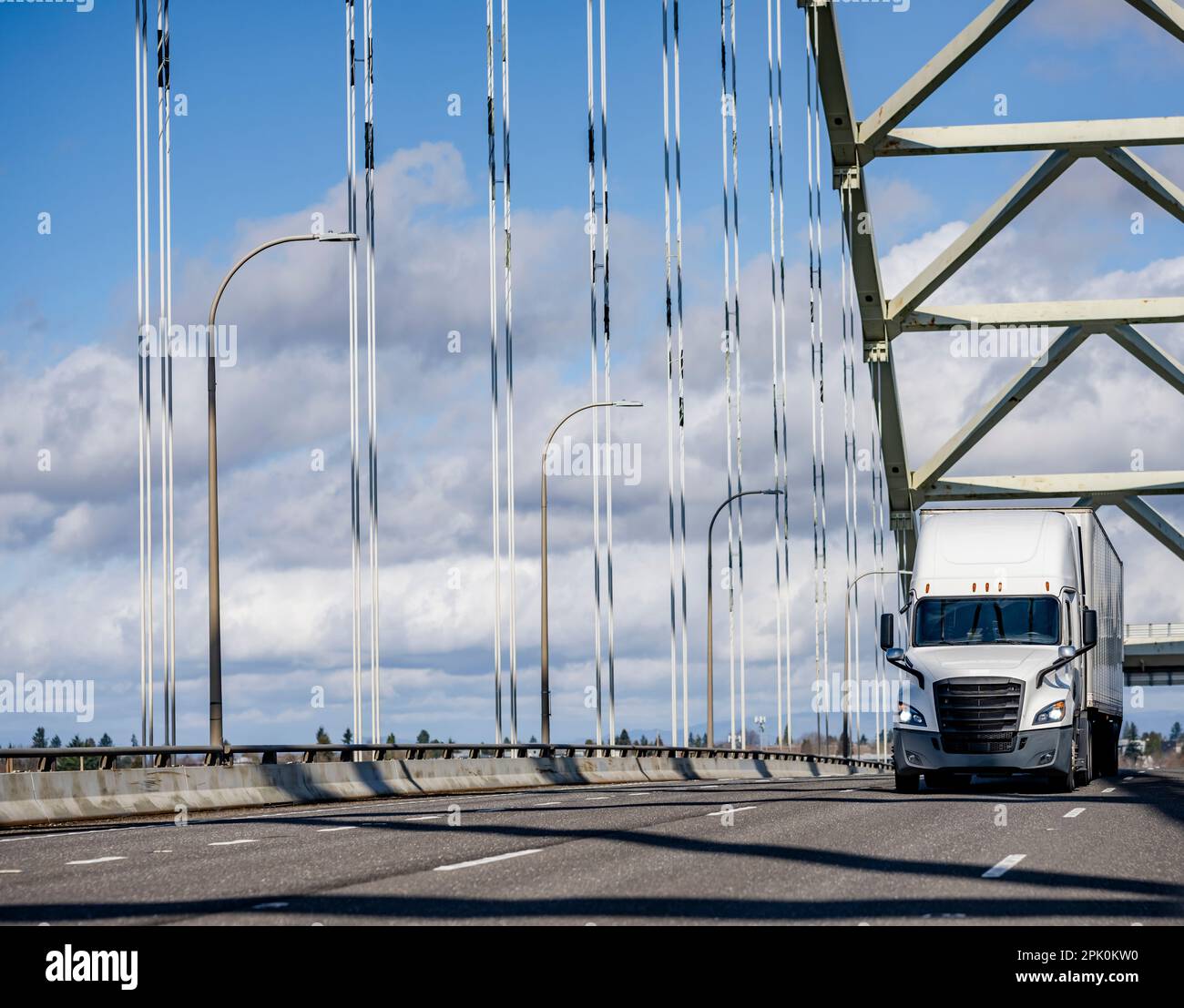 High cab profile white long hauler big rig industrial semi truck ...