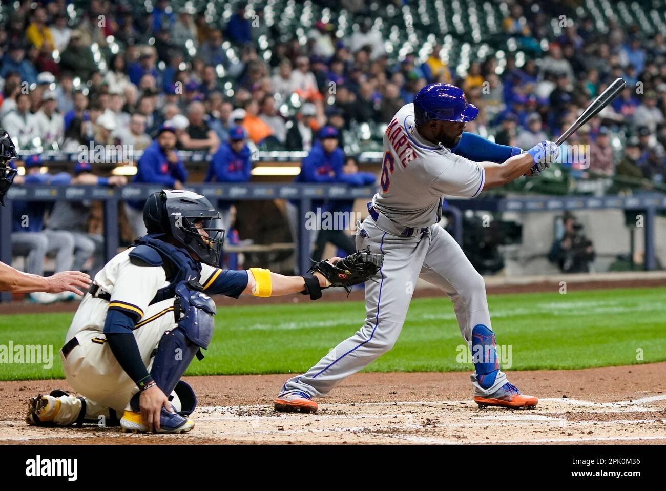New York Mets' Starling Marte hits a single during the third inning of ...