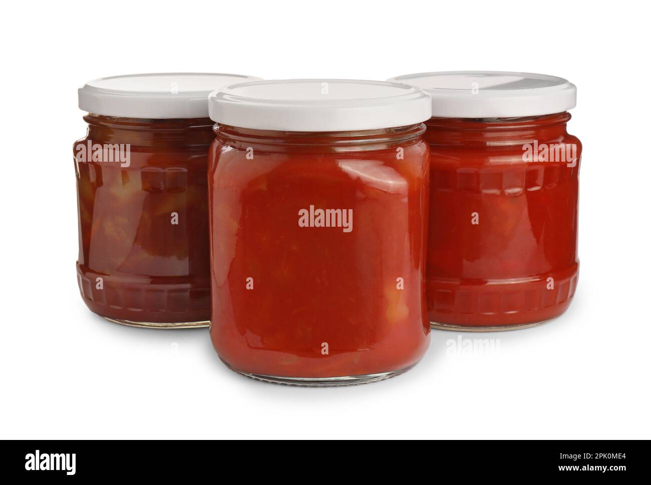 Glass jars of delicious canned lecho on white background Stock Photo ...