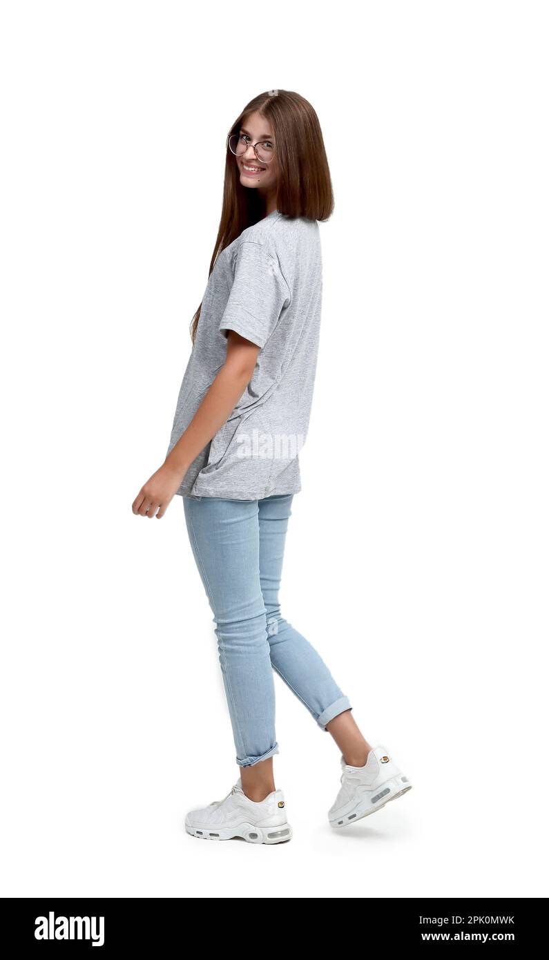 side view. smiling young woman looking at the camera Stock Photo - Alamy