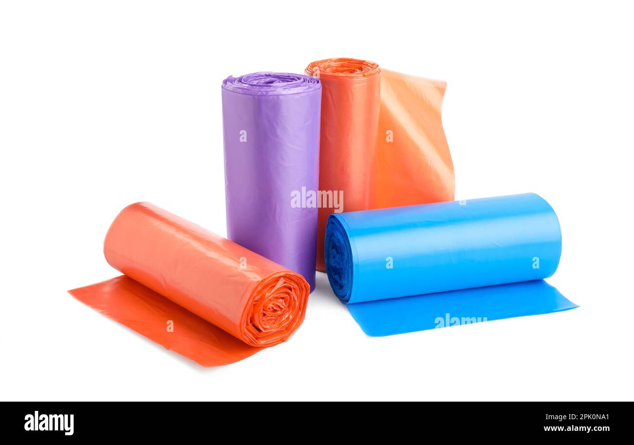 Rolls of different color garbage bags isolated on white Stock Photo - Alamy