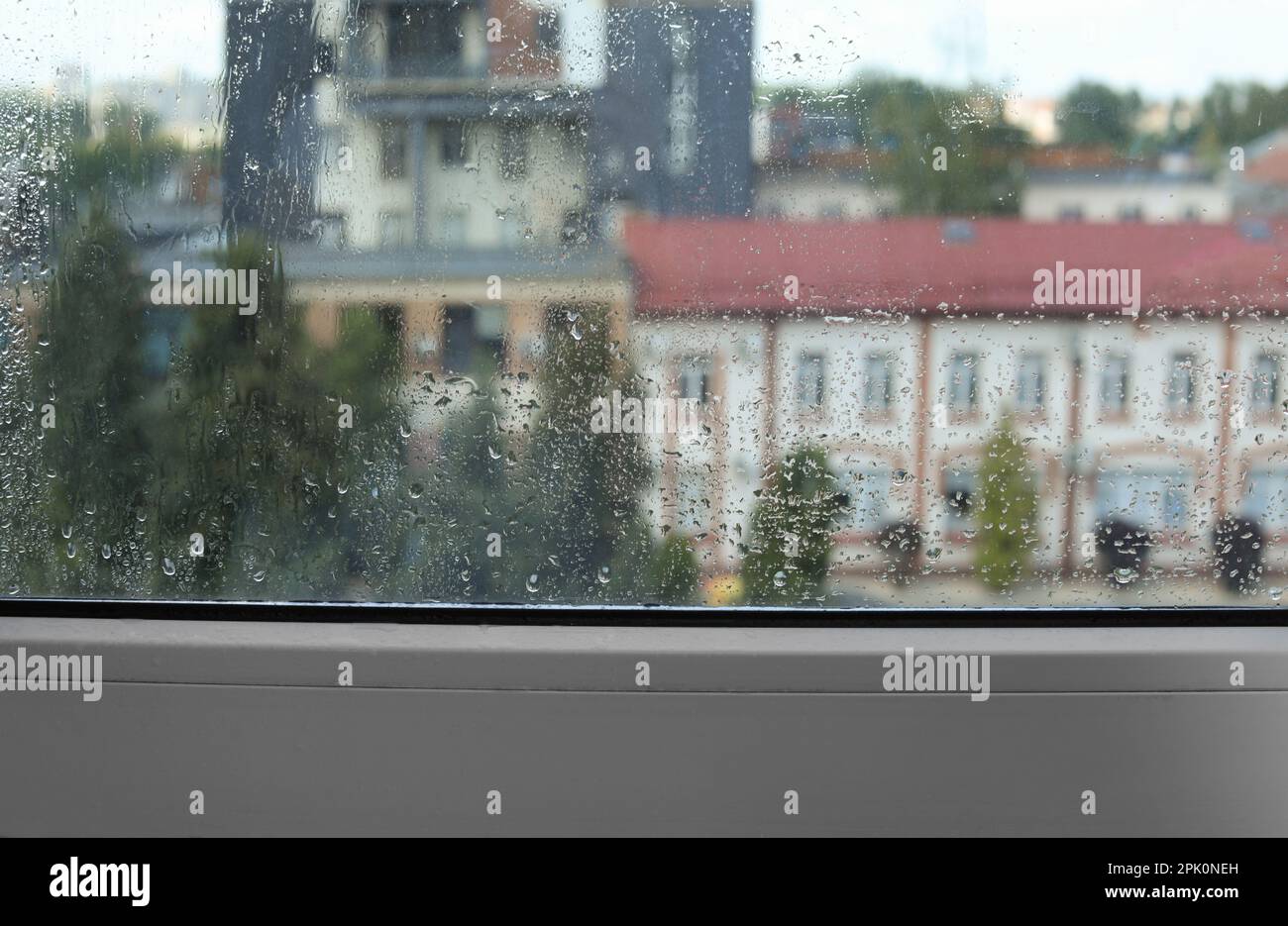 Wet window on rainy day, closeup. View from inside Stock Photo - Alamy