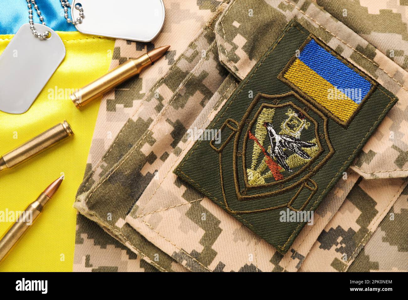 Ukrainian military uniform with chevron, bullets and ID tags on ...