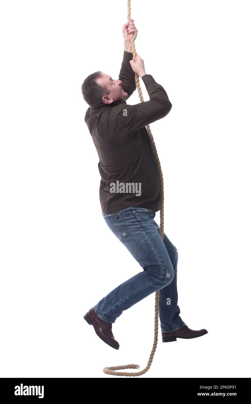 purposeful man climbing the rope. isolated on a white background Stock ...