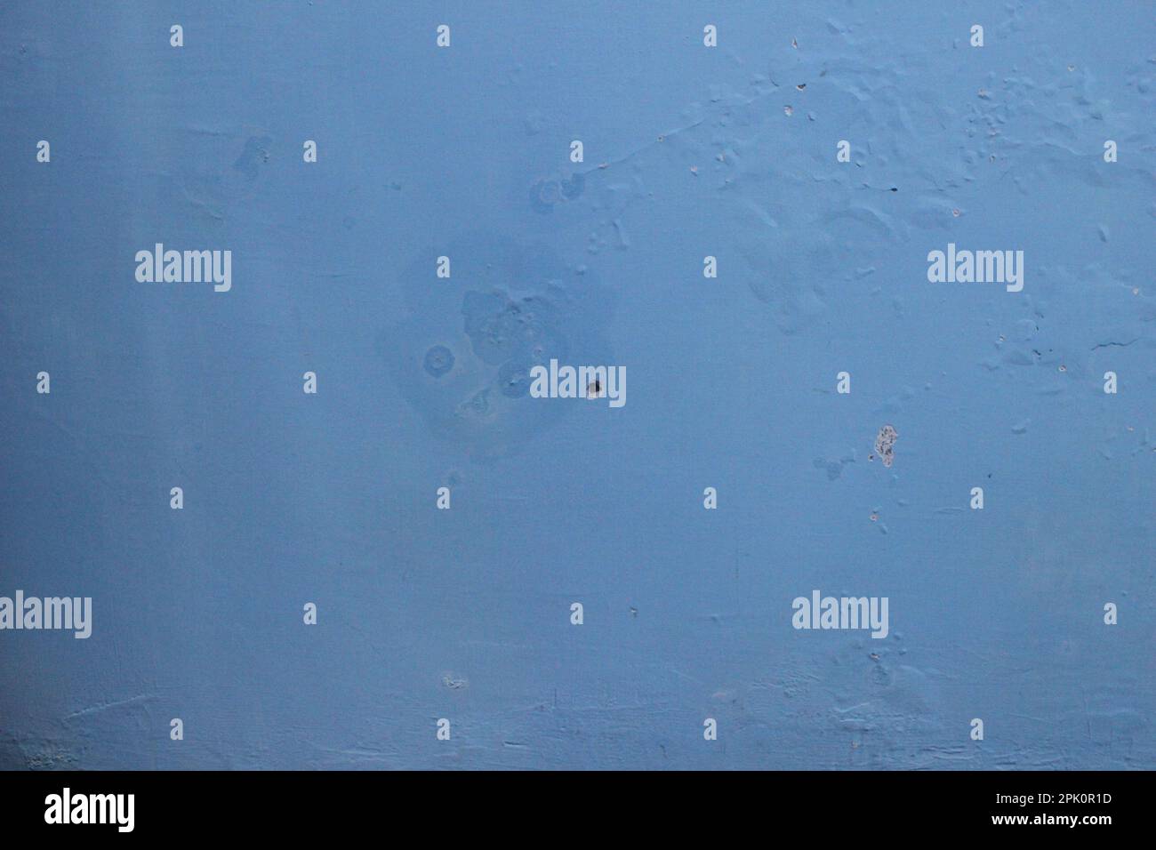 broken blue wall due to lack of maintenance Stock Photo - Alamy